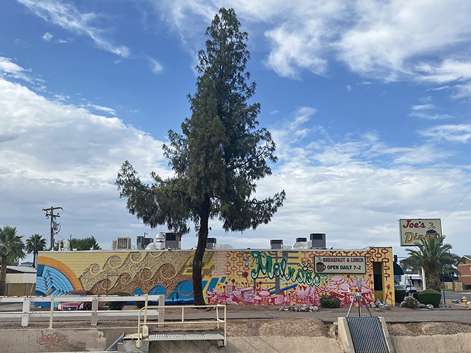 The unassuming yellow exterior of Joe's Diner stands like a beacon of breakfast hope on 7th Avenue, promising comfort food treasures within.