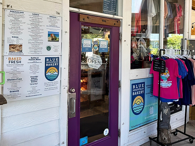 The cheerful blue and yellow exterior of Blue Mountain Bakery stands out like a tropical oasis against Florida's coastal landscape.