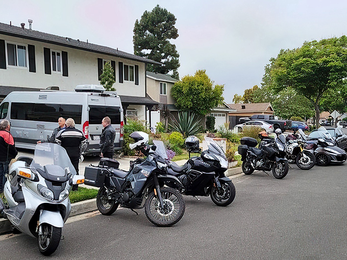 The heart of barbecue magic: R+Q's impressive smoker stands ready to transform ordinary meat into extraordinary memories under California's palm-lined skies.