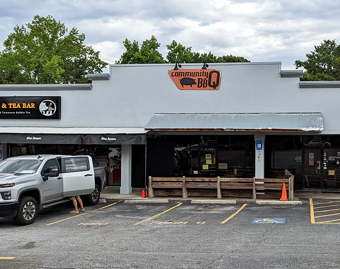 The unassuming storefront of Community Q BBQ might not stop traffic, but what's happening inside should be headline news across Georgia.