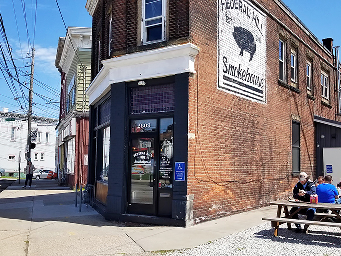 The corner brick building with its iconic pig silhouette sign promises smoked meat paradise within. Erie's barbecue beacon stands ready to welcome hungry pilgrims.