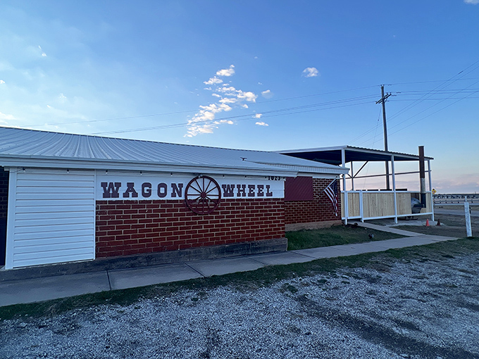 The Wagon Wheel Dance Hall stands proudly like a mirage of barbecue dreams in the Texas countryside.