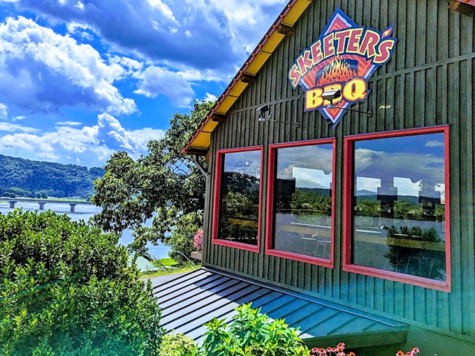 Rustic charm meets serious BBQ business at Skeeter's, where that wooden exterior and fiery logo promise smoky delights within.