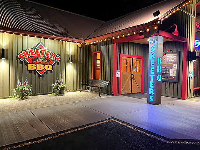 Skeeter's BBQ glows like a barbecue beacon in the night, with string lights and that iconic red trim beckoning hungry travelers to stop and stay awhile.