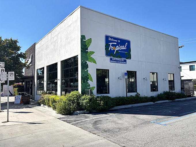 The rustic wooden fa&ccedil;ade of Tropical Smokehouse beckons like a siren song to BBQ lovers. Florida greenery frames this temple of smoke with a promise of delicious things to come.