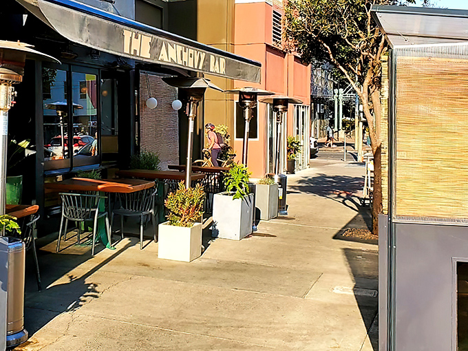 The Anchovy Bar's inviting exterior beckons seafood lovers with its understated elegance. Those outdoor tables? Prime real estate for San Francisco people-watching while savoring oceanic delights.