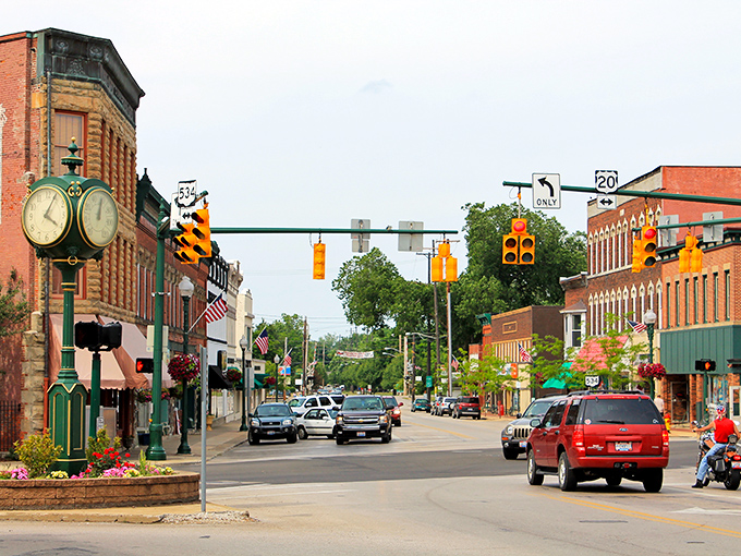 Downtown Geneva's vintage street clock stands sentinel over brick-lined streets that could double as a movie set for "Small Town America: The Director's Cut."