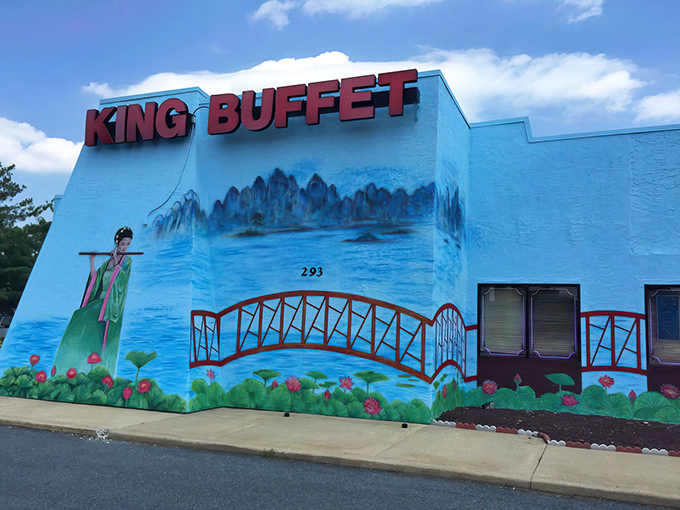 The vibrant blue exterior of King Buffet stands out like a culinary oasis in Dover, its painted landscape promising Eastern delights within.