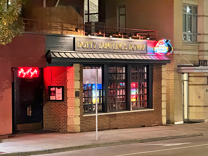 The golden lettering of Dotty Dumpling's Dowry gleams against brick and glass, like a treasure chest waiting to be discovered in downtown Madison. 