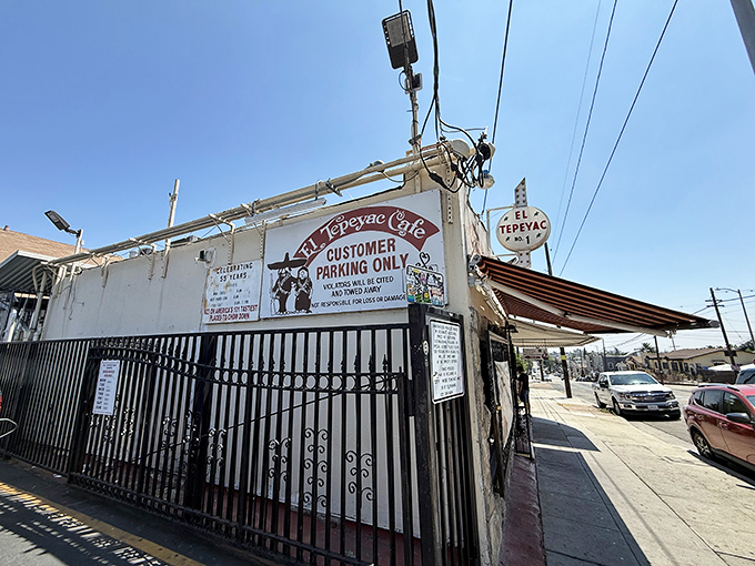 The unassuming exterior of El Tepeyac Cafe stands like a culinary lighthouse in Boyle Heights, promising giant burritos to those brave enough to enter.