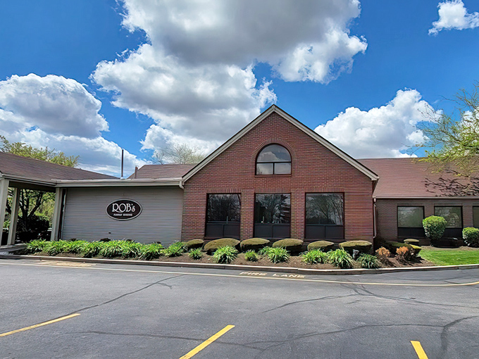 The brick exterior whispers "come in" while the landscaping practically shouts "we care about details here."