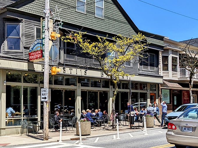 Presti's iconic storefront on Mayfield Road beckons with outdoor seating where locals gather to enjoy pastries and watch Little Italy's vibrant street life unfold.