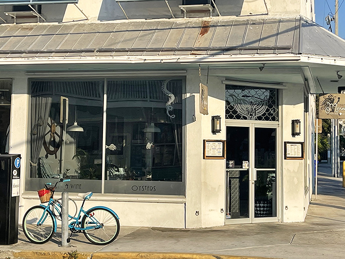 The mermaid-adorned entrance beckons like a siren's call, promising seafood treasures within this unassuming Fleming Street gem.