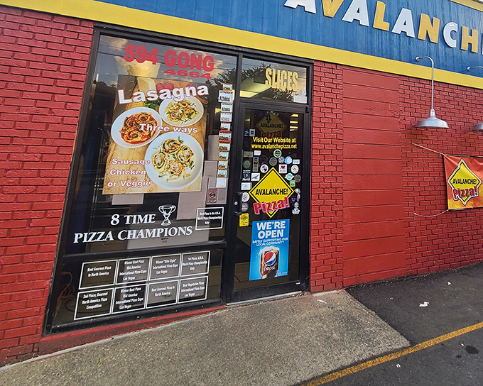 The bright red brick exterior of Avalanche Pizza stands as a beacon of hope for the hungry in Athens, Ohio. Eight-time pizza champions don't need fancy facades.