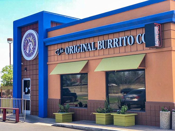 That blue and orange exterior might look modest, but inside lies burrito paradise waiting to happen.
