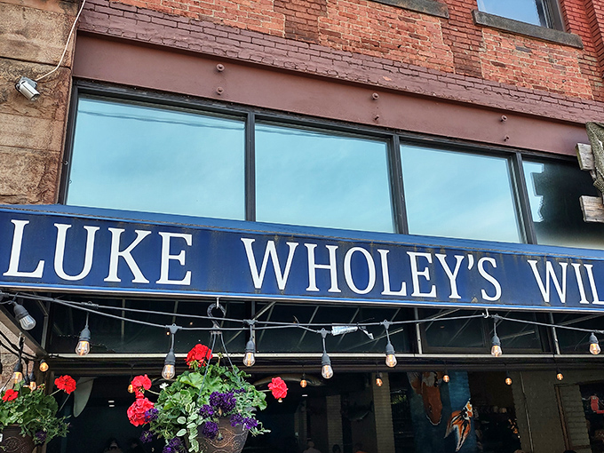 The iconic blue awning of Luke Wholey's beckons seafood lovers like a lighthouse calling ships to shore. String lights add a touch of whimsy to this Pittsburgh gem.