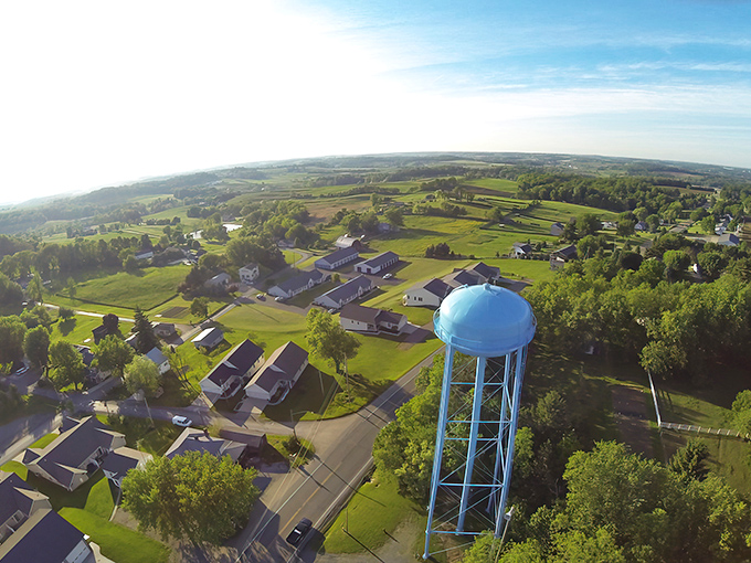 Historic brick buildings line the street like old friends gathering for their daily conversation.