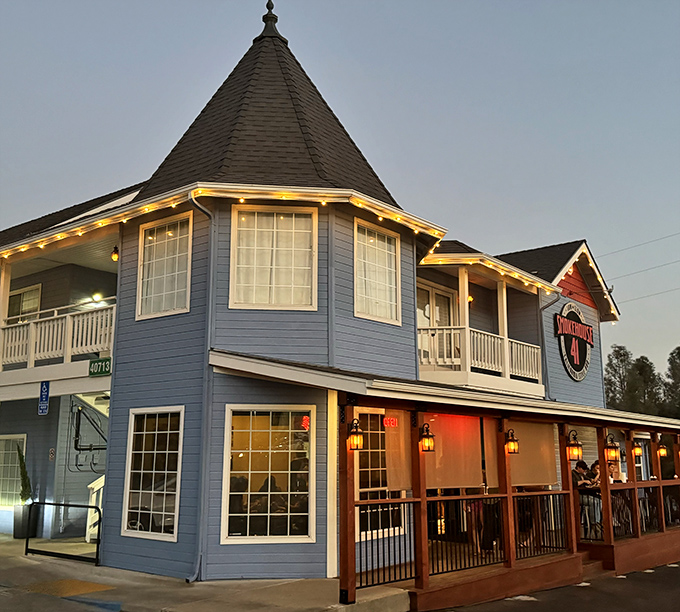 The blue beacon of barbecue bliss! Smokehouse 41's distinctive exterior promises smoky treasures within, like a delicious mirage in the Sierra foothills.