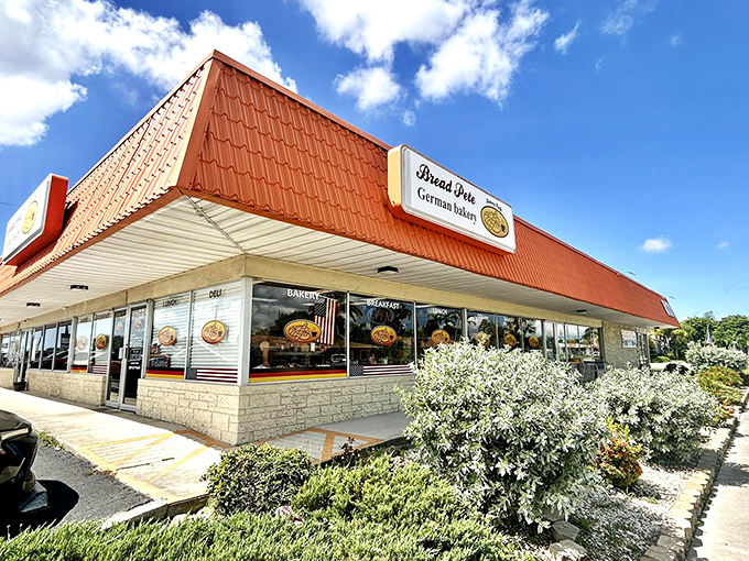 The distinctive orange roof of Bread Pete stands out like a beacon for carb-lovers, promising German baking traditions in the heart of Cape Coral.