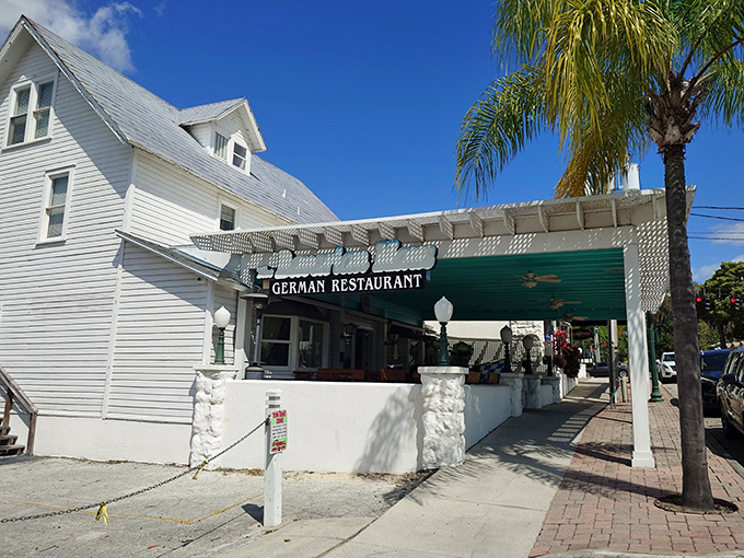 The charming facade of Bavarian Haus welcomes you with its distinctive blue and white signage&mdash;a little slice of Munich hiding in plain sight in Mount Dora.