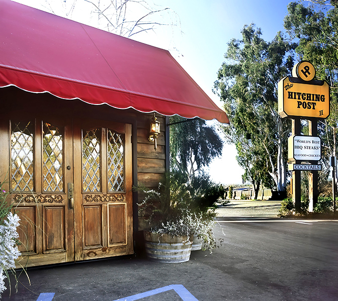The iconic red awning and rustic wooden entrance of Hitching Post 2 stands as a beacon for steak lovers throughout California's wine country.