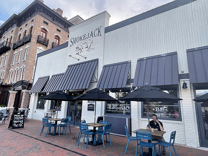 Smokejack's classic white brick exterior stands proud in downtown Alpharetta, where the aroma of hickory smoke serves as the neighborhood's most enticing welcome mat.