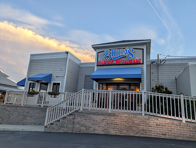 Bubba's welcomes you with that perfect coastal charm &ndash; a blue-awninged beacon of seafood promise against a golden Virginia Beach sunset. 