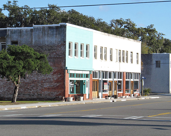 Highway signs pointing to Brunswick and Savannah &ndash; the perfect roadmap for your coastal Georgia adventure where small-town treasures await between big-city destinations.