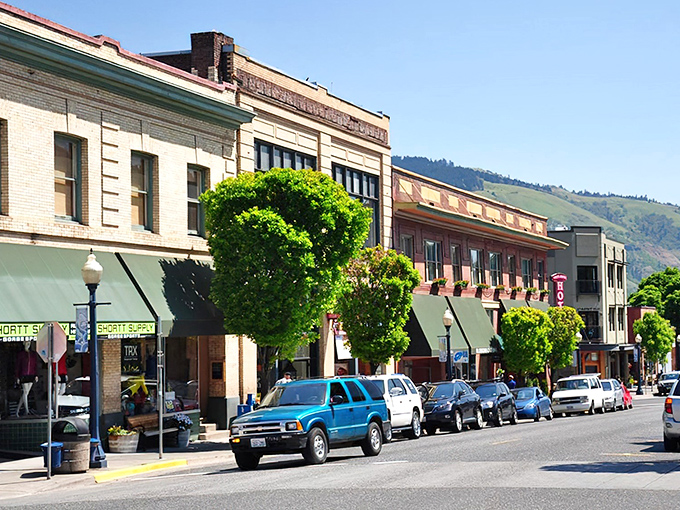Downtown Hood River's historic buildings stand like well-dressed sentinels, their awnings providing shade for window shoppers and their mountain backdrop stealing the show.