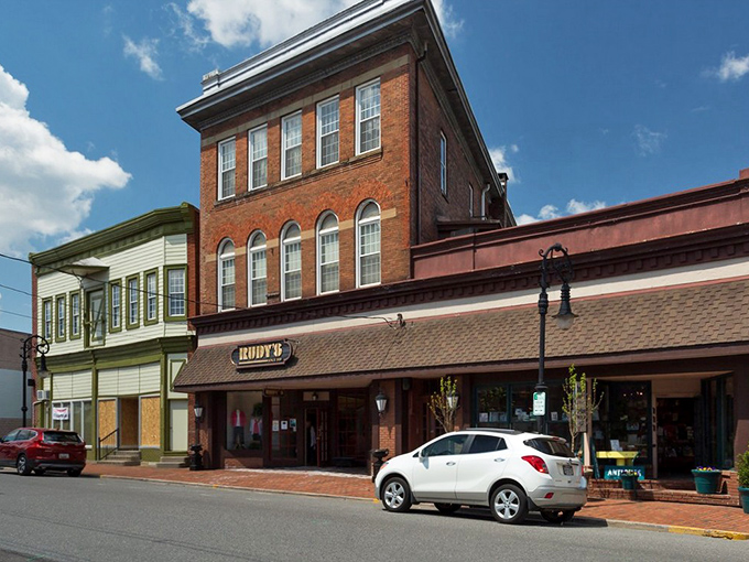 Historic storefronts with bright red awnings &ndash; like a Norman Rockwell painting that somehow serves excellent coffee and Wi-Fi.