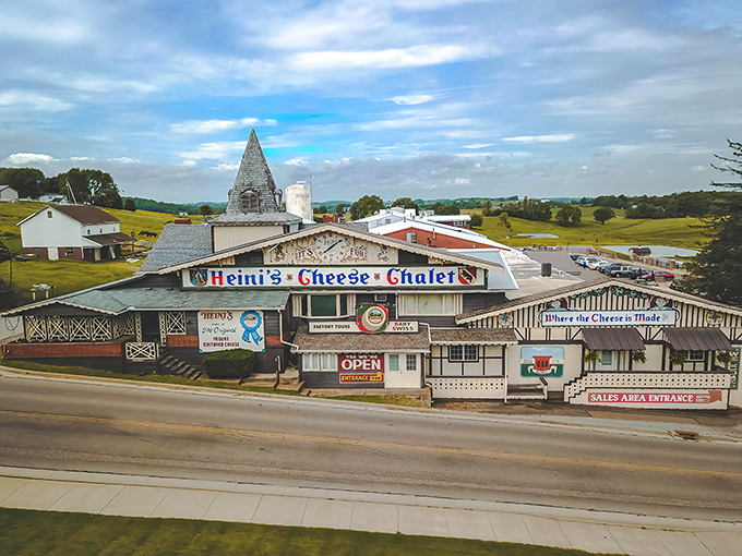 The Swiss chalet-style facade isn't just charming architecture—it's a dairy beacon that's been calling cheese pilgrims to Millersburg since FDR was signing New Deals.