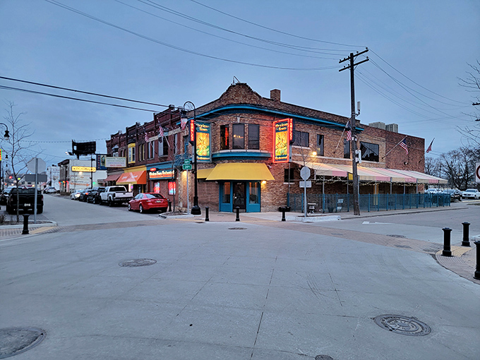 The corner brick building with its distinctive yellow awnings has been a Detroit landmark for generations of enchilada enthusiasts.