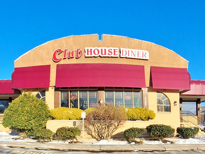 The iconic red awnings of Club House Diner beckon like a culinary lighthouse, promising comfort and satisfaction to hungry Bensalem travelers.
