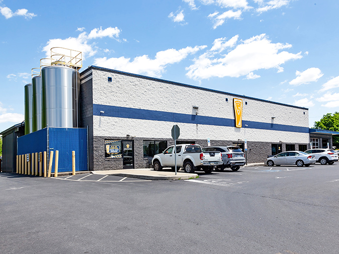 The unassuming exterior of Pizza Boy Brewing in Enola hides a beer lover's paradise. Those gleaming tanks aren't just for show—they're working overtime on liquid happiness.