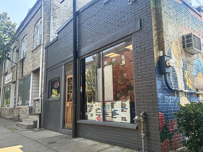 The unassuming gray brick exterior of Speed's hides culinary treasures within, like a sandwich speakeasy waiting to be discovered.