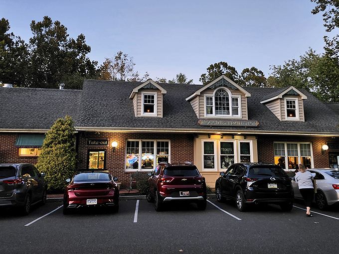 The charming brick exterior of Moccia's Train Stop beckons hungry travelers like a culinary lighthouse in Schwenksville's dining landscape.