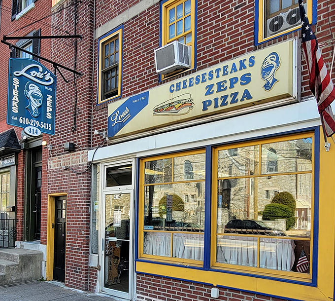 The storefront that launched a thousand cravings. Lou's iconic blue and yellow facade has been beckoning hungry Norristown locals since 1941.