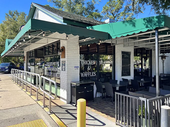 The green awning beckons like an old friend, promising comfort food treasures within this Jacksonville landmark. No fancy frills needed when the chicken and waffles speak for themselves.