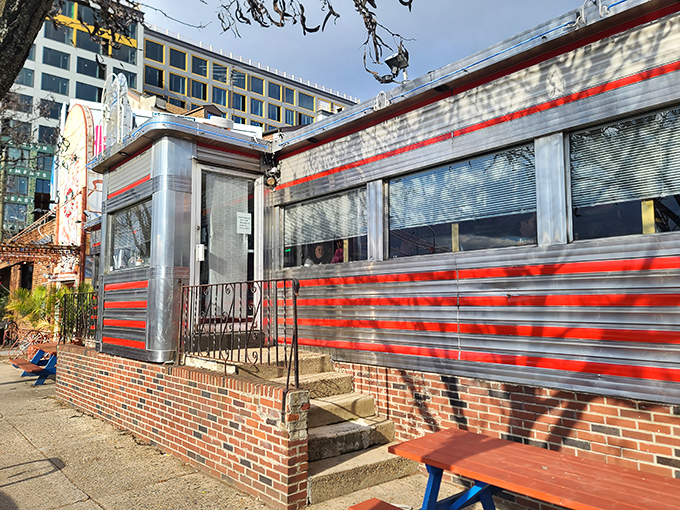 The gleaming stainless steel exterior of Silk City stands like a time capsule in Philadelphia's Northern Liberties, its red stripes promising retro delights within.