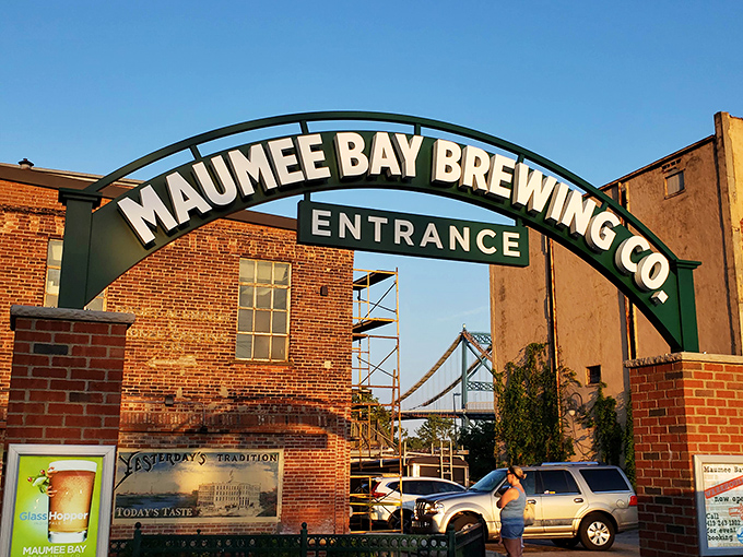 The iconic arched entrance beckons like a portal to beer paradise. Brick, history, and brewing excellence await beyond this Toledo landmark.