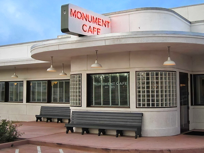 This retro diner exterior whispers promises of comfort food that'll make your grandmother jealous.