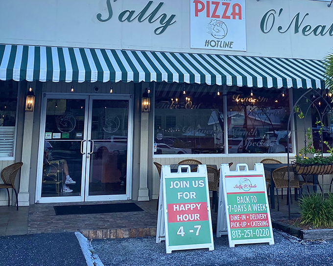 The iconic green and white striped awning of Sally O'Neal's beckons like an old friend, promising Italian comfort in the heart of Tampa.