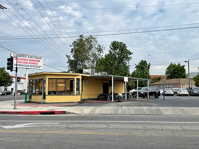 This cheerful yellow cottage looks like it wandered off a postcard and decided to serve breakfast burritos instead.