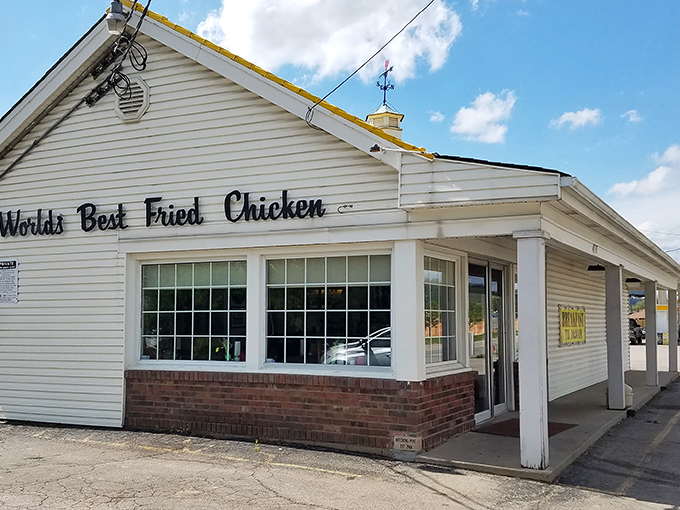 The modest white building with its sunshine-yellow roof boldly proclaims "World's Best Fried Chicken" – a claim that generations of Cincinnatians have found hard to dispute.