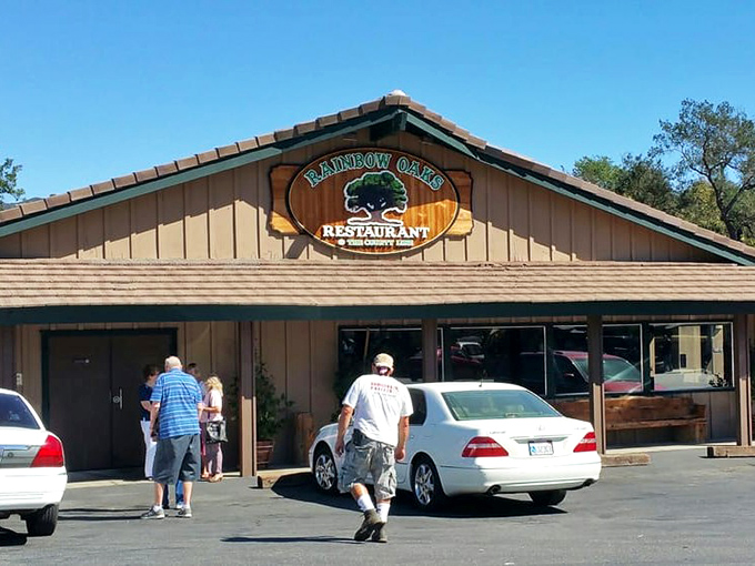 The quintessential California roadhouse beckons with rustic charm, three proud flags, and the promise of comfort food that'll make your soul sing.