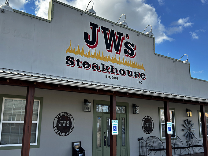 The unassuming exterior of J W's Steakhouse proves once again that in Texas, the most spectacular food often hides behind the most modest facades.