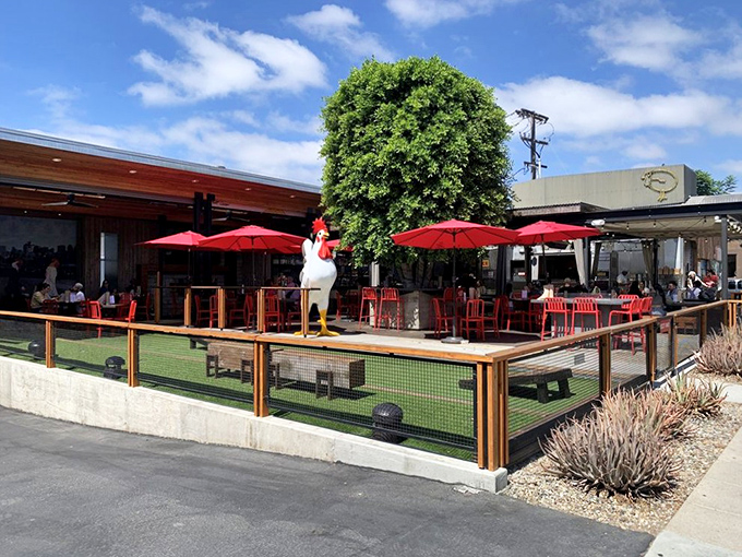 The giant chicken statue standing guard outside The Crack Shack isn't just decoration&mdash;it's a beacon calling to hungry souls across San Diego's Little Italy neighborhood.