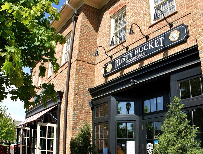 The brick facade of Rusty Bucket welcomes you like an old friend who happens to make incredible food. Classic tavern charm with modern appeal.