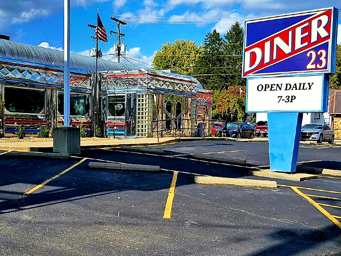The gleaming stainless steel exterior of Maddy's Diner 23 shines like a time machine to the golden age of roadside Americana.
