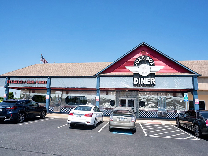 The bright red roof and iconic jukebox logo of Juke Box Diner stand out like a beacon for hungry travelers. This Manassas landmark promises a time-traveling culinary experience.